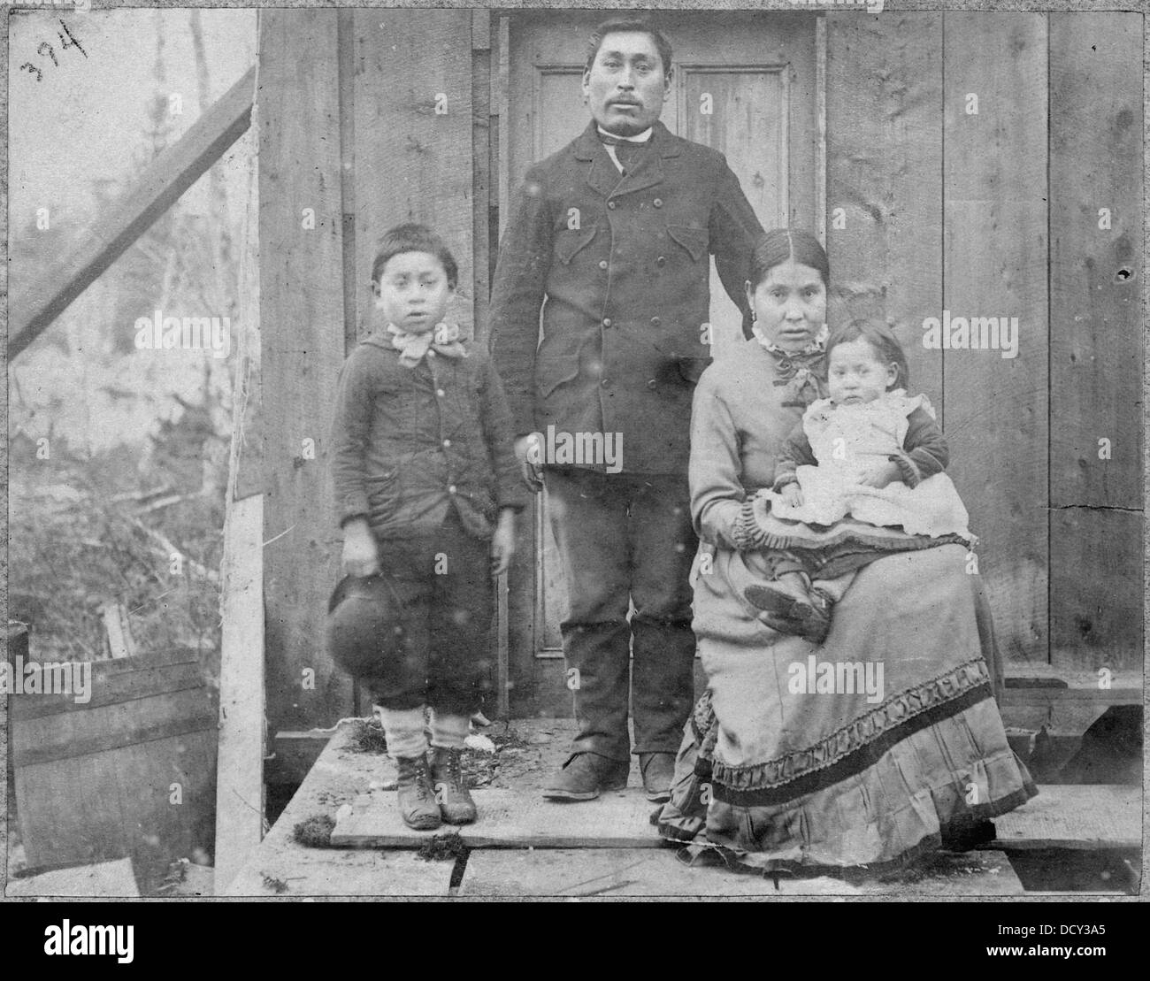 This photograph captures an Indian family, likely from a Native ...
