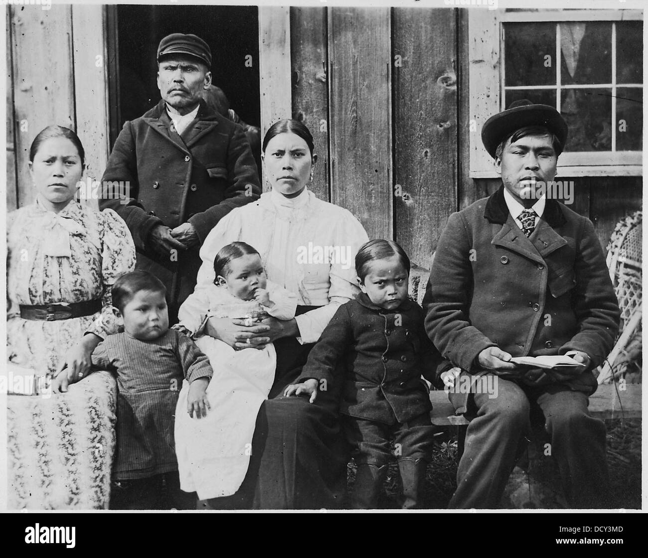 This image portrays an Indian family, capturing a moment in their daily ...