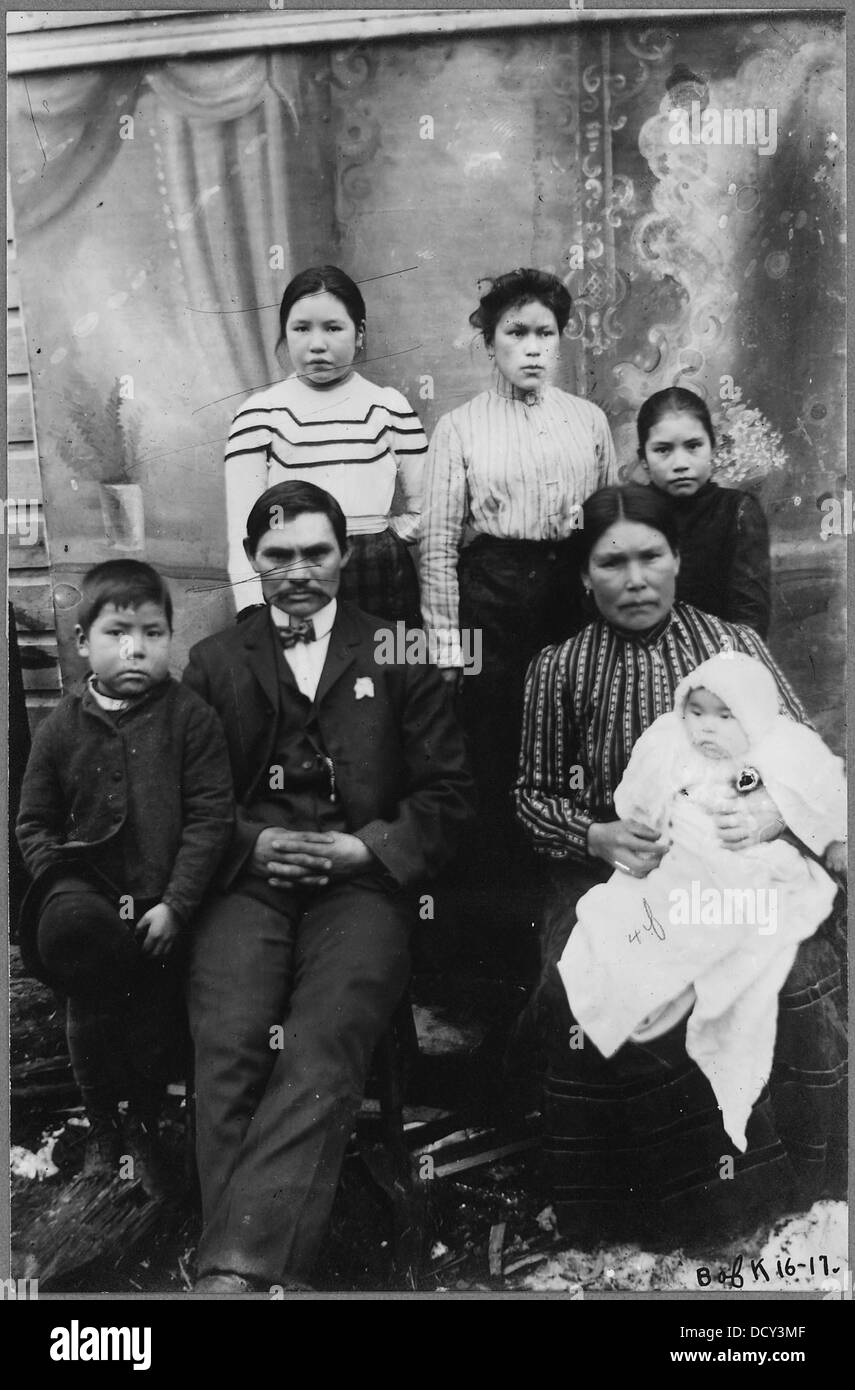 A historical photograph depicting an Indian family, likely representing ...