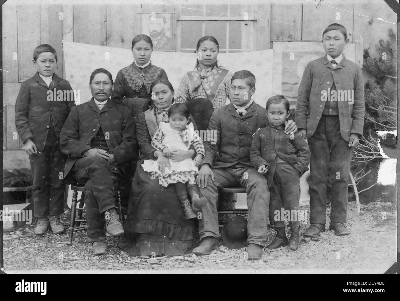 A photograph of an Indian family, likely showing a moment of daily life ...