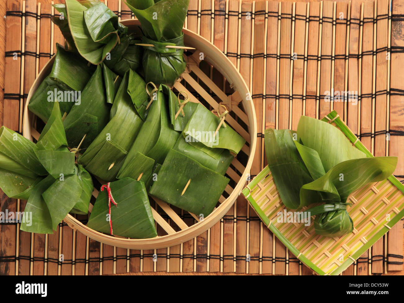 Burmese steamed fish in banana leaves Stock Photo - Alamy