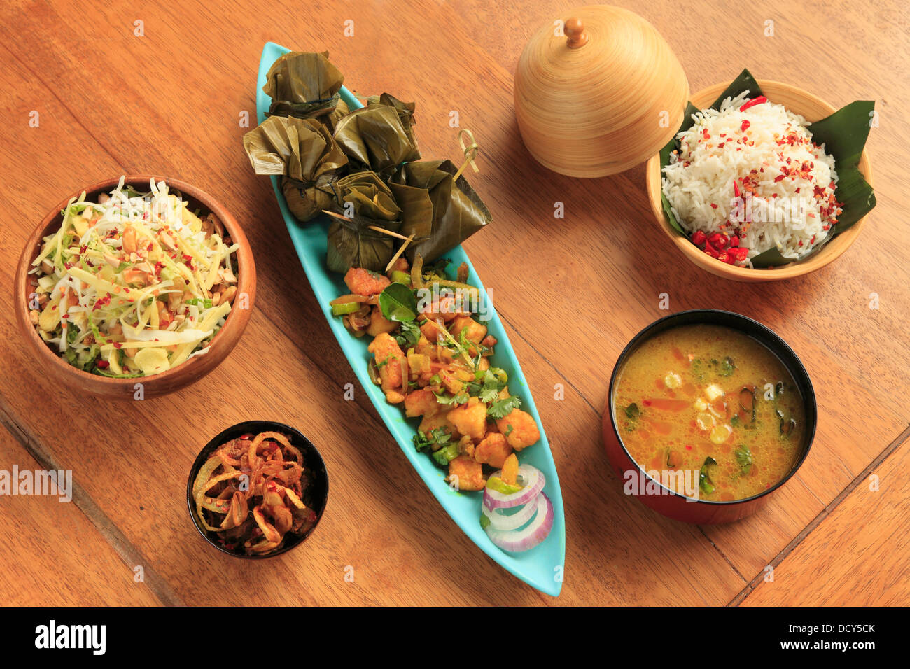 Burmese meal, fish, fish soup, salad, rice, balachaung Stock Photo - Alamy