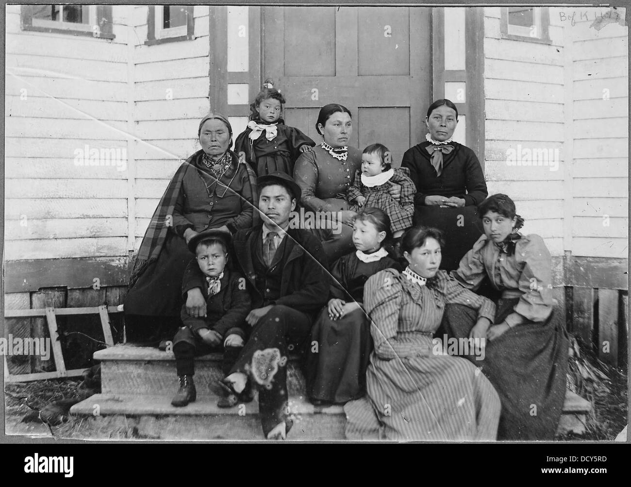 A photograph depicting an Indian family, reflecting traditional or ...