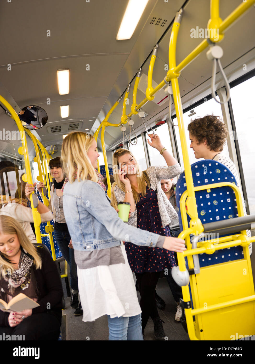People in a bus Stock Photo - Alamy