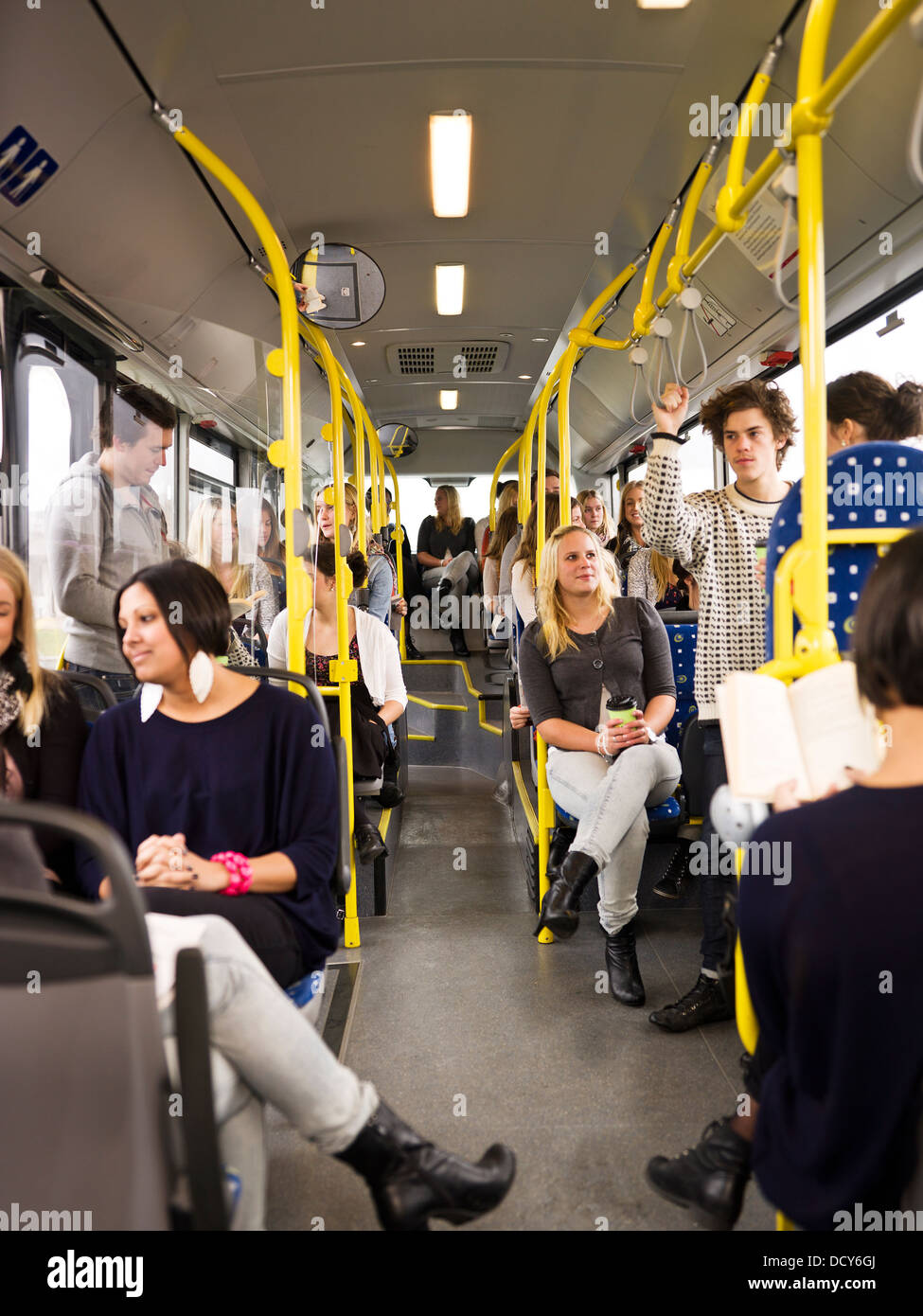 People in a bus Stock Photo - Alamy