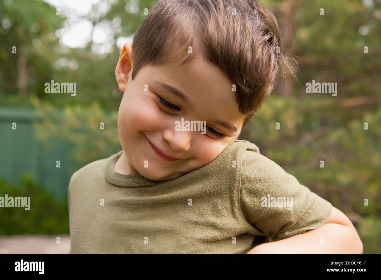 Portrait Of Small Boy Being Shy; St. Albert, Alberta, Canada Stock ...