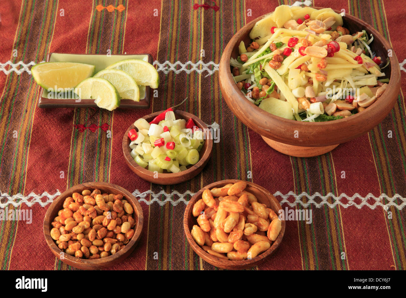 Burmese ginger salad with side dishes Stock Photo - Alamy
