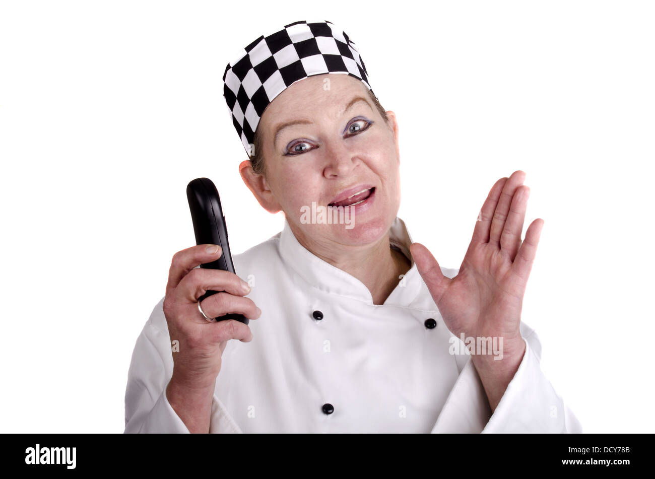 female chef in work clothes holding a mobile phone Stock Photo - Alamy