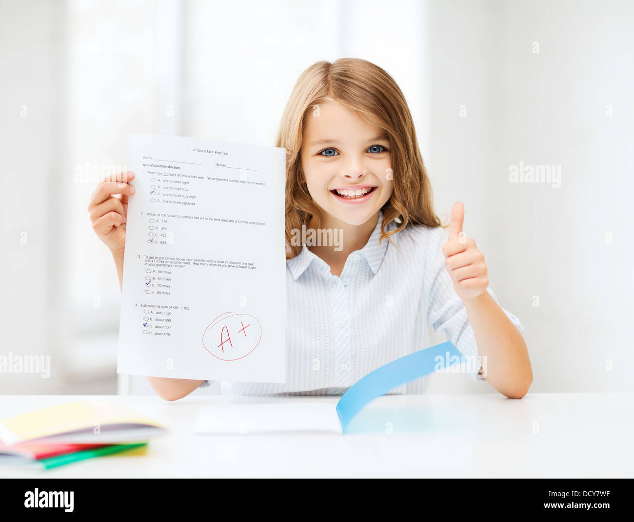 girl with test and grade at school Stock Photo - Alamy