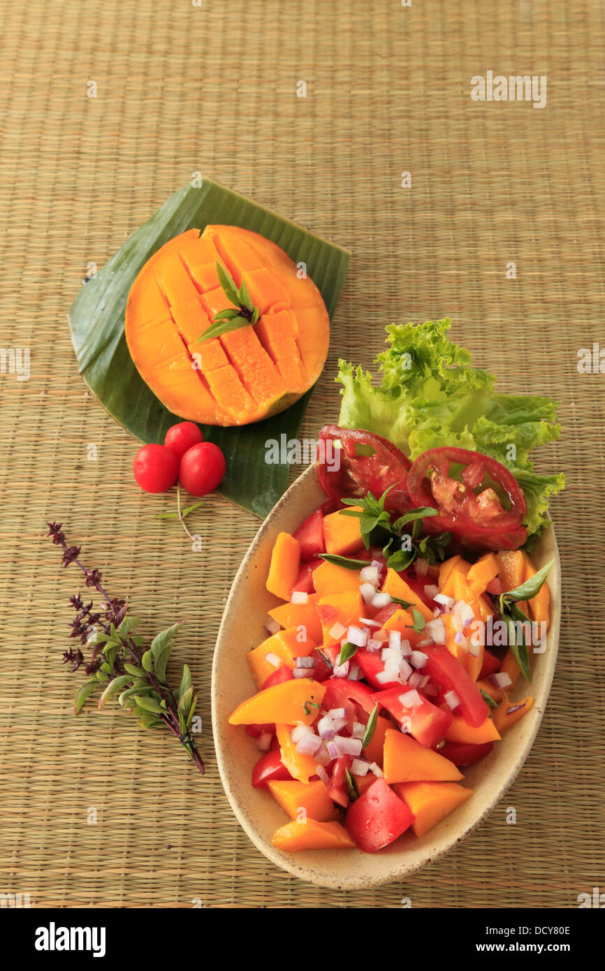 Mango, tomato and basilic salad Stock Photo - Alamy