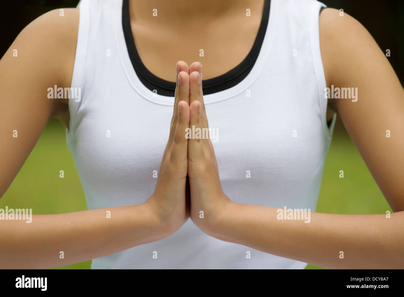 Close-up of woman's hands in prayer position Stock Photo - Alamy