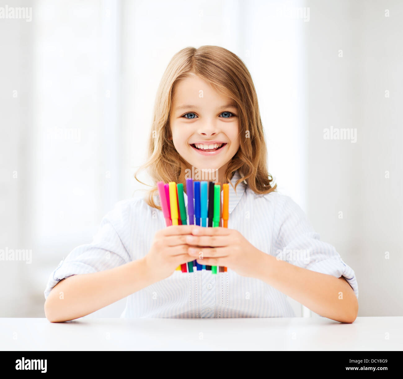 girl showing colorful felt-tip pens Stock Photo - Alamy