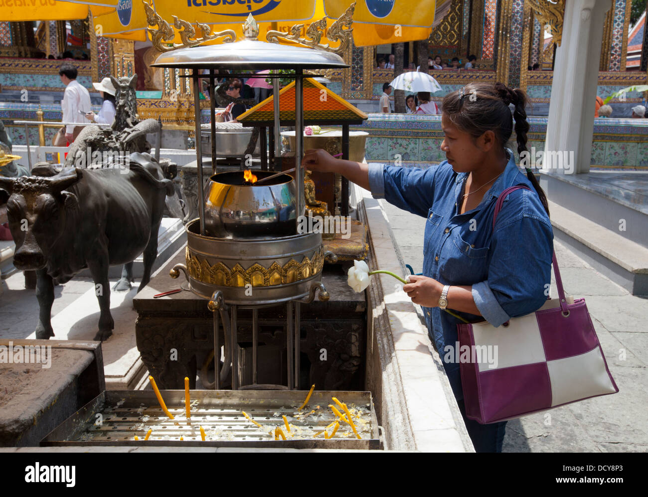 Buddhists pray in the Grand Palace complex, in the heart of Bangkok ...