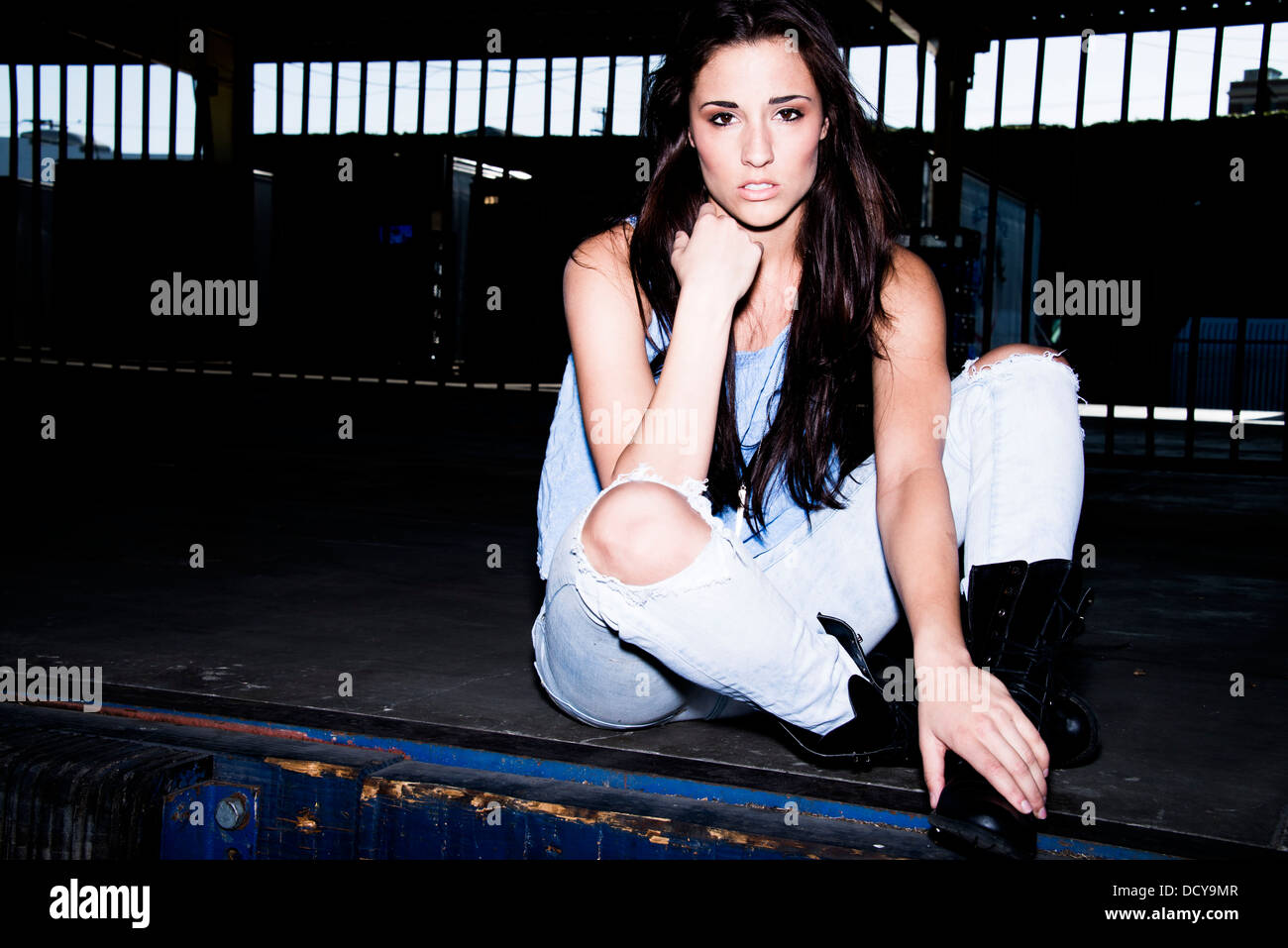 Woman sitting ground hi-res stock photography and images - Alamy