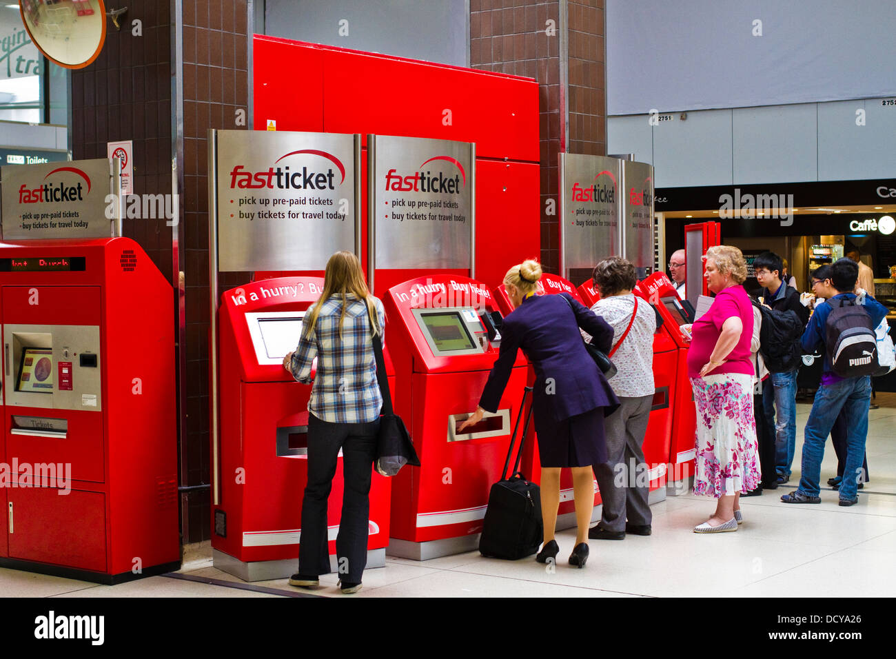 Passengers using Virgin trains Fast ticket machines at Birmingham ...