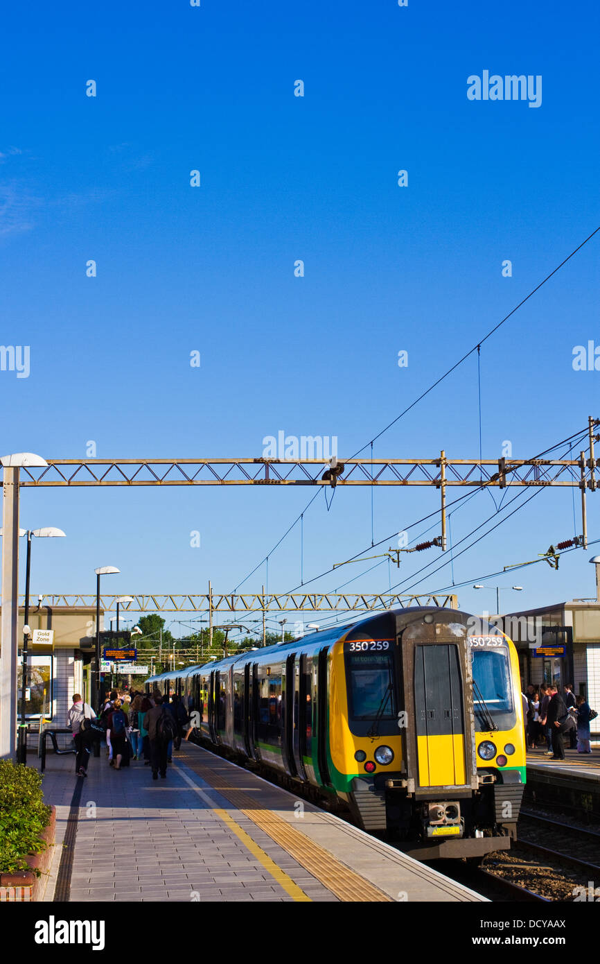 Passengers on platform waiting for train at Watford Junction railway ...