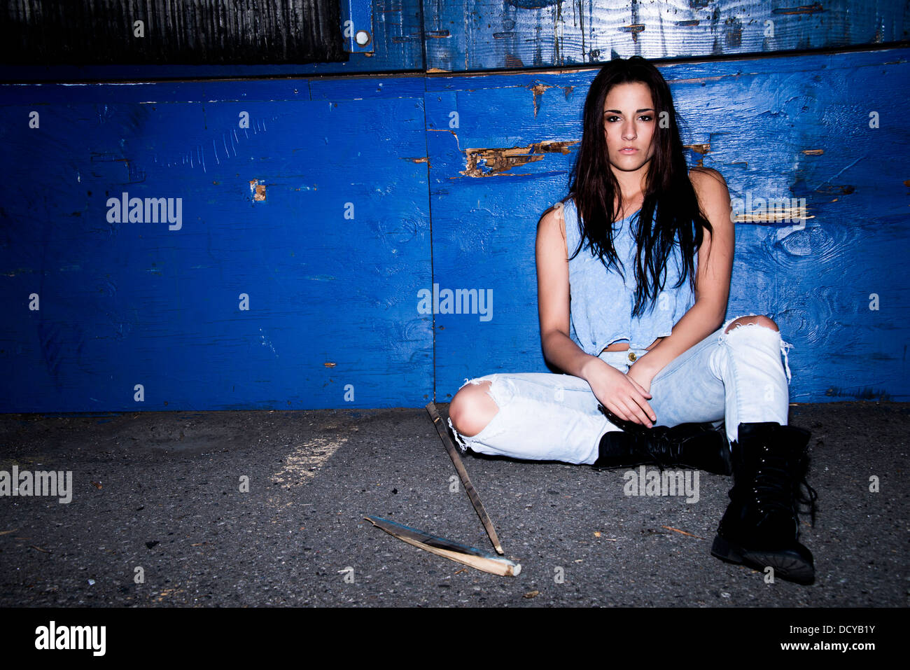 Woman sitting ground hi-res stock photography and images - Alamy