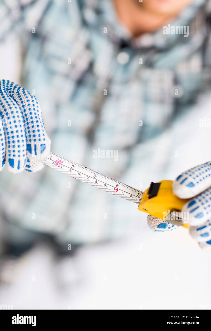 architect measuring wall with flexible ruler Stock Photo - Alamy