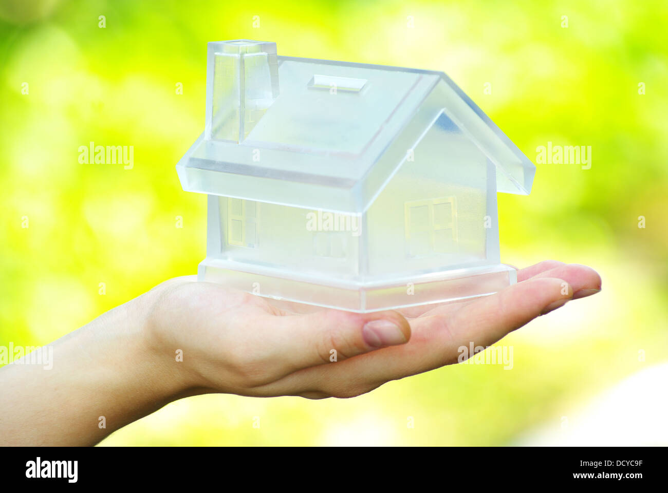 house in hand Stock Photo - Alamy