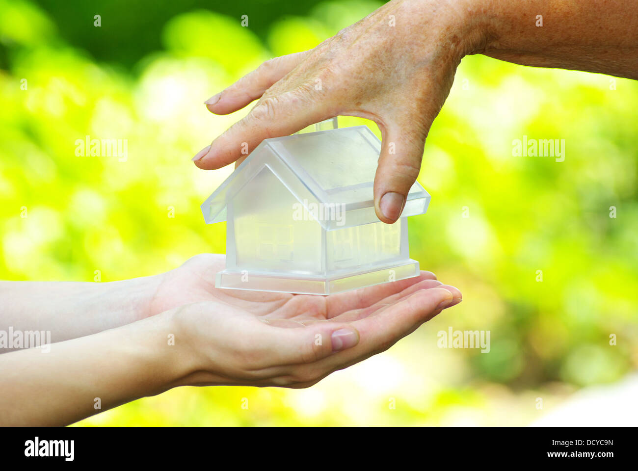 house in hand Stock Photo - Alamy