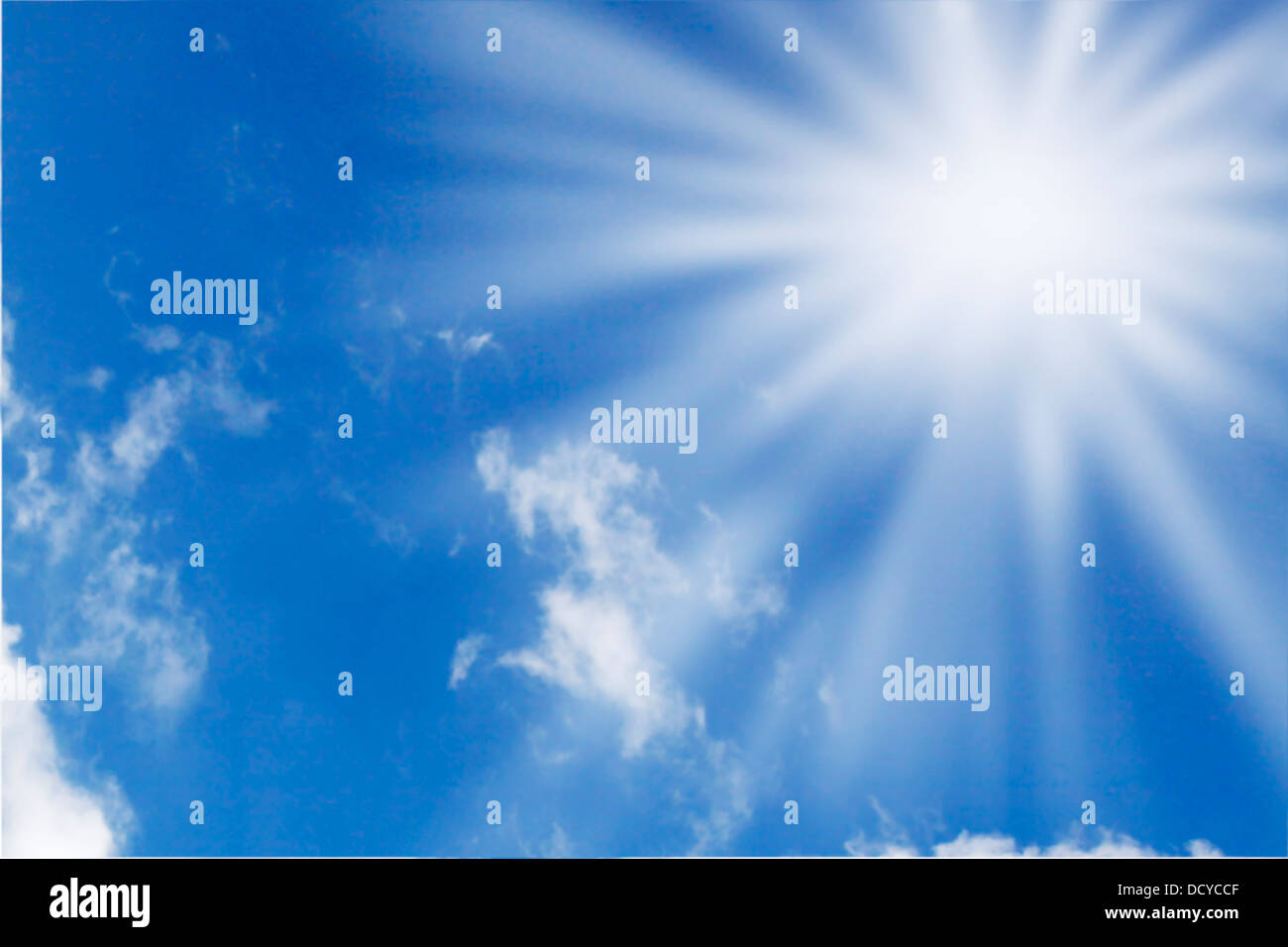 sun with rays on a blue sky Stock Photo - Alamy