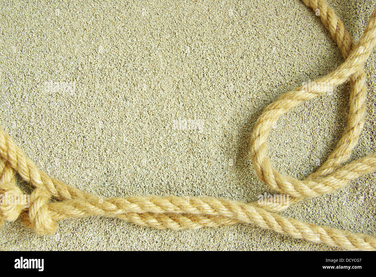 rope on sand Stock Photo - Alamy