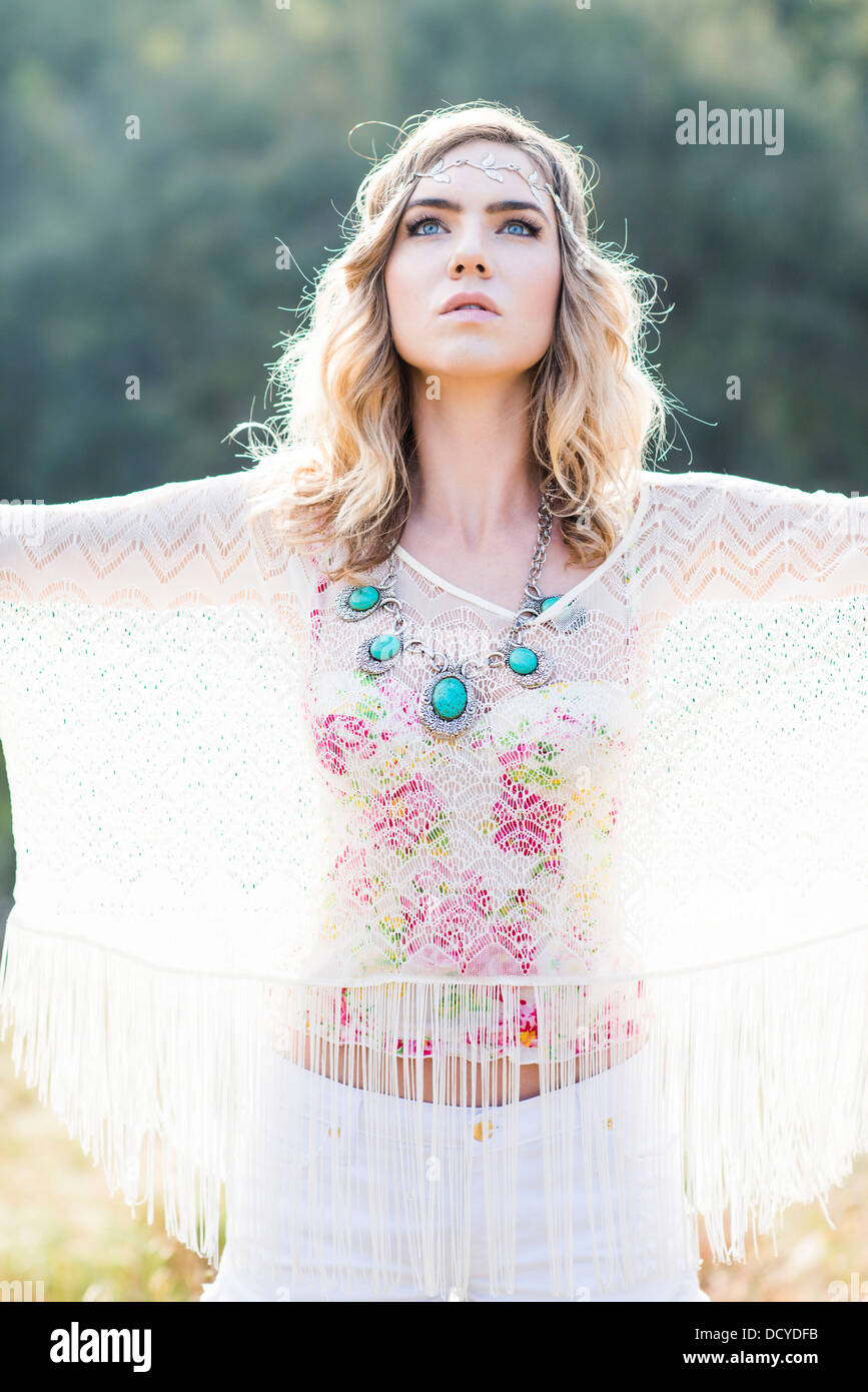 Young Woman Outdoors with Arms Extended Stock Photo - Alamy