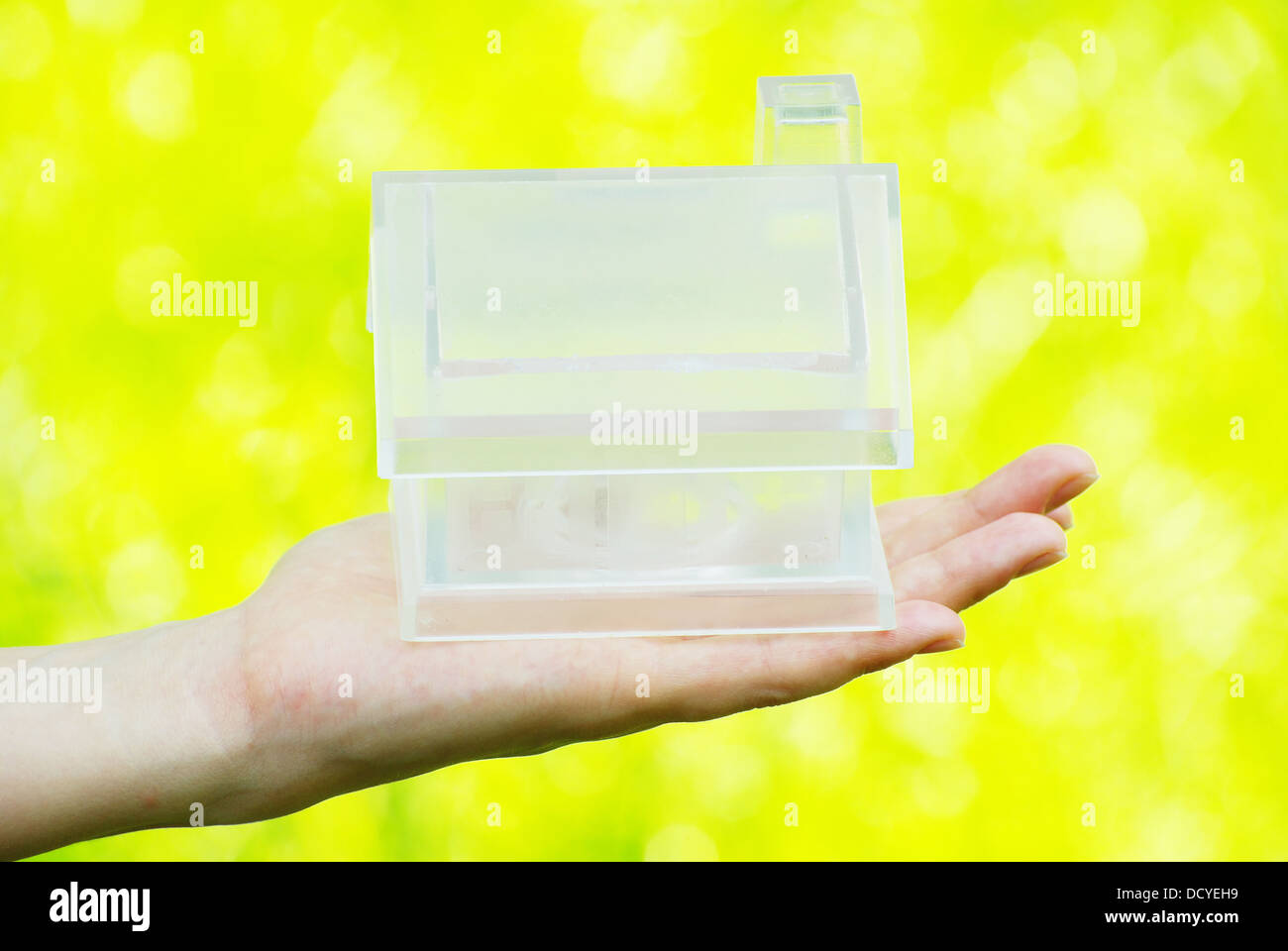 house in hand Stock Photo - Alamy