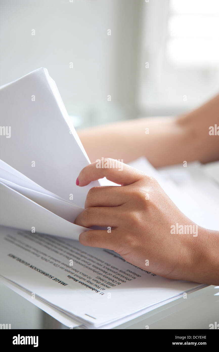 Woman sorting bills hi-res stock photography and images - Alamy