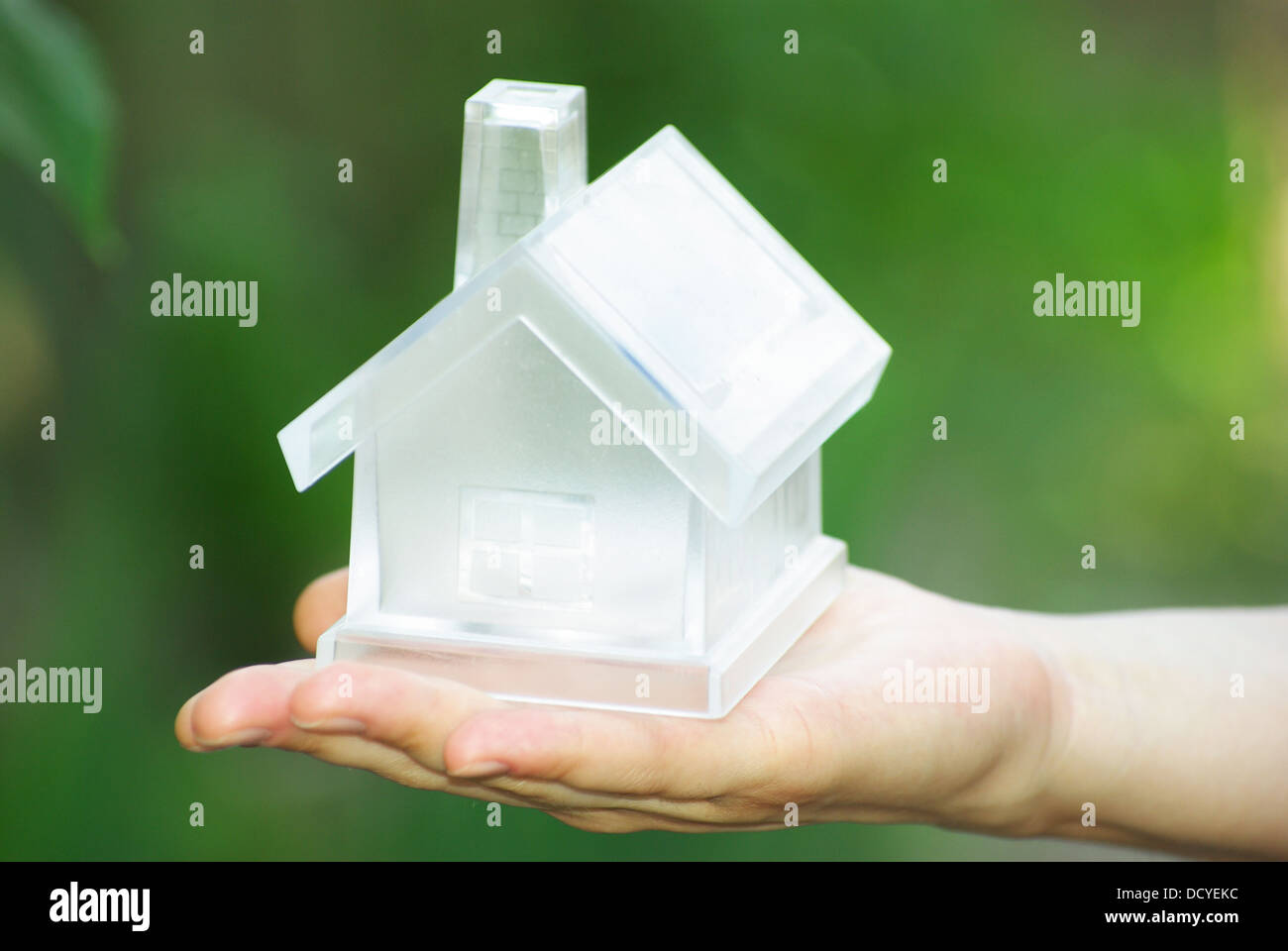 house in hand Stock Photo - Alamy