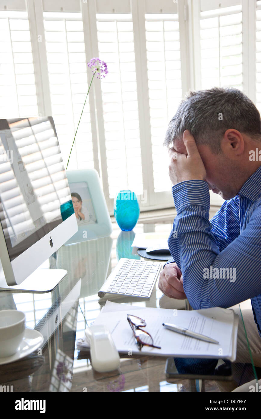 Man desk office profile sitting hi-res stock photography and images - Alamy