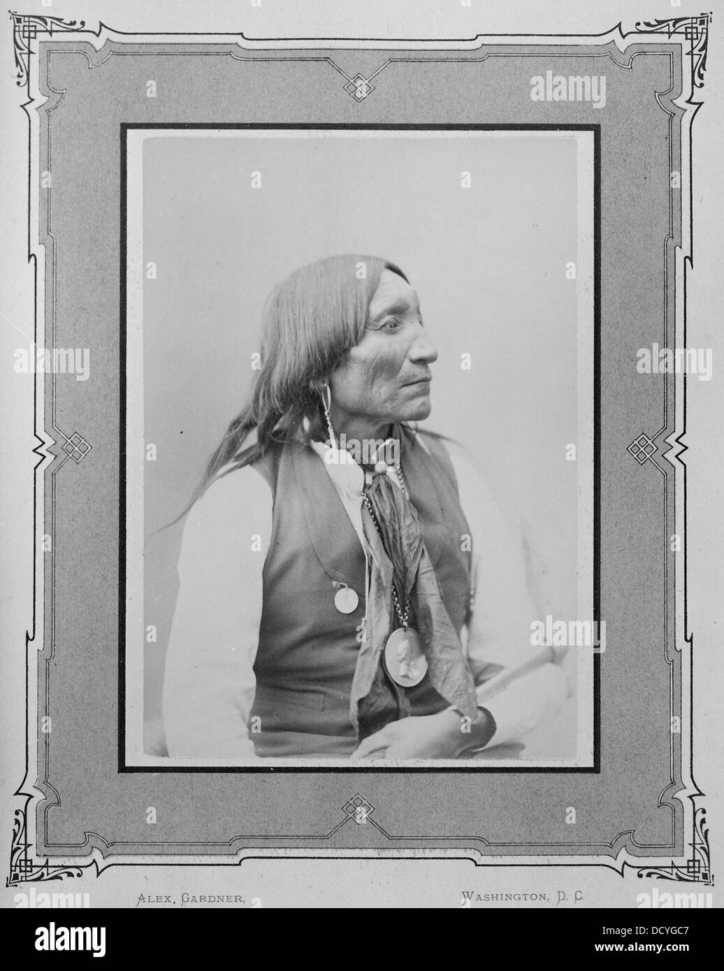 Lone Wolf was a prominent leader of the Kiowa tribe. This photograph captures him, reflecting ...