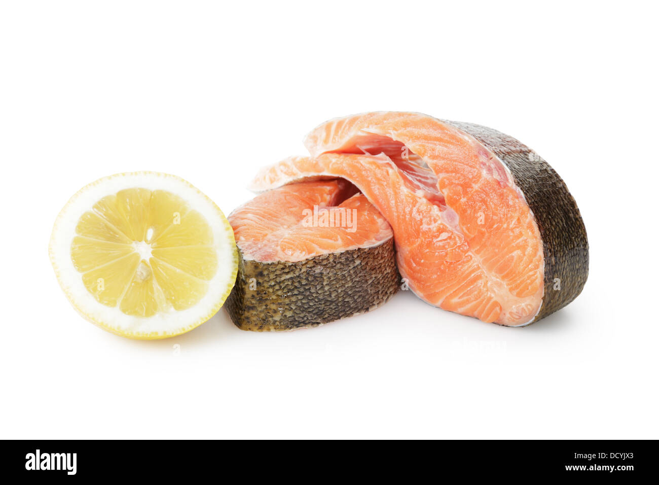 fresh trout steaks with lemon, on white background Stock Photo - Alamy