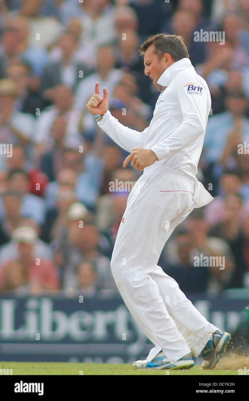 London, UK. 22nd Aug, 2013. Graeme Swann celebrates taking the wicket ...