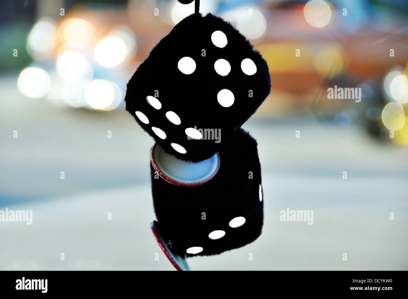 Fuzzy dice hanging from rear hi-res stock photography and images - Alamy