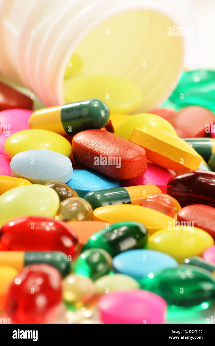 Composition with dietary supplement capsules and drug pills Stock Photo ...