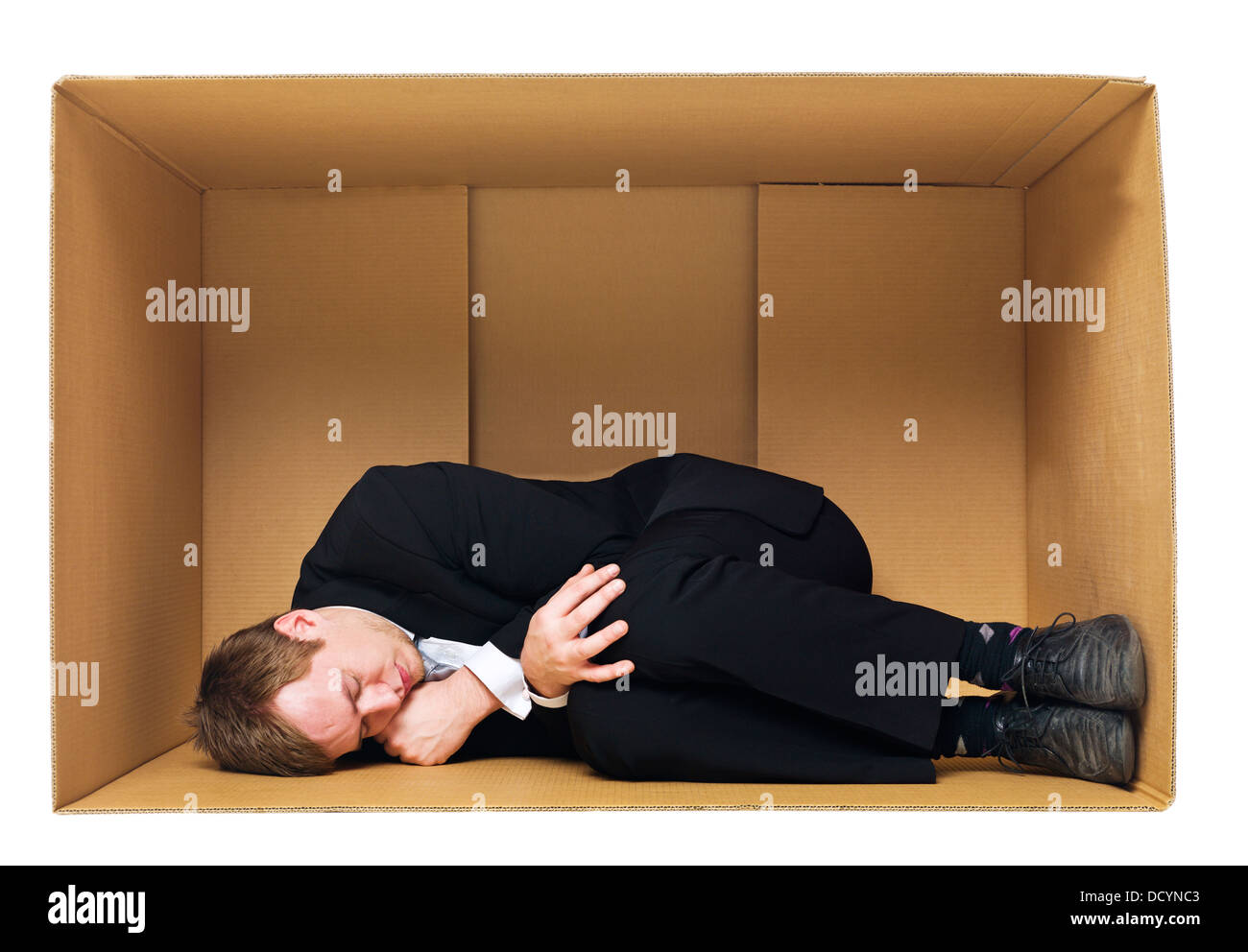 Sleeping in a cardboard box Stock Photo - Alamy