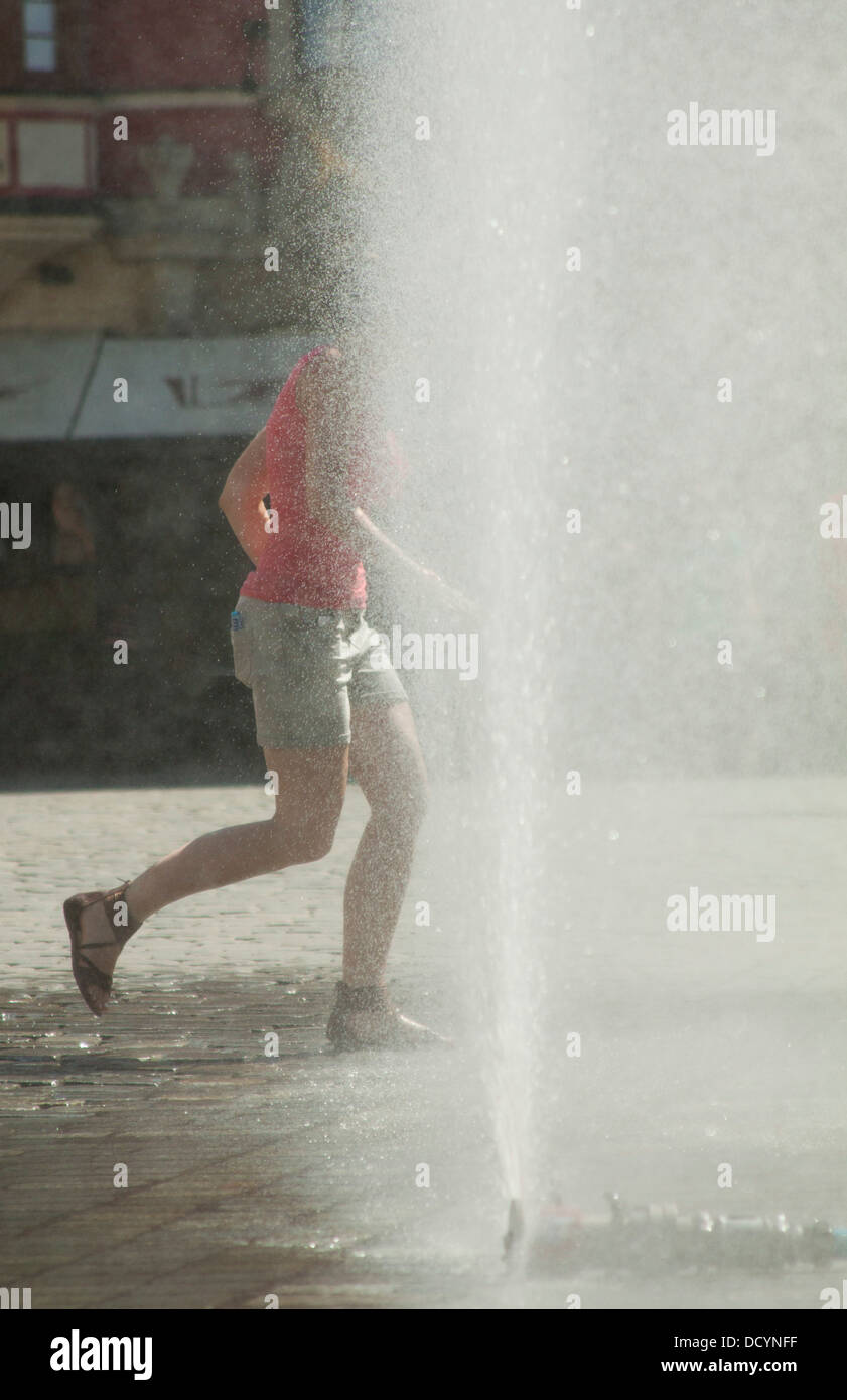 Water spray in city center during hot summer day Stock Photo - Alamy