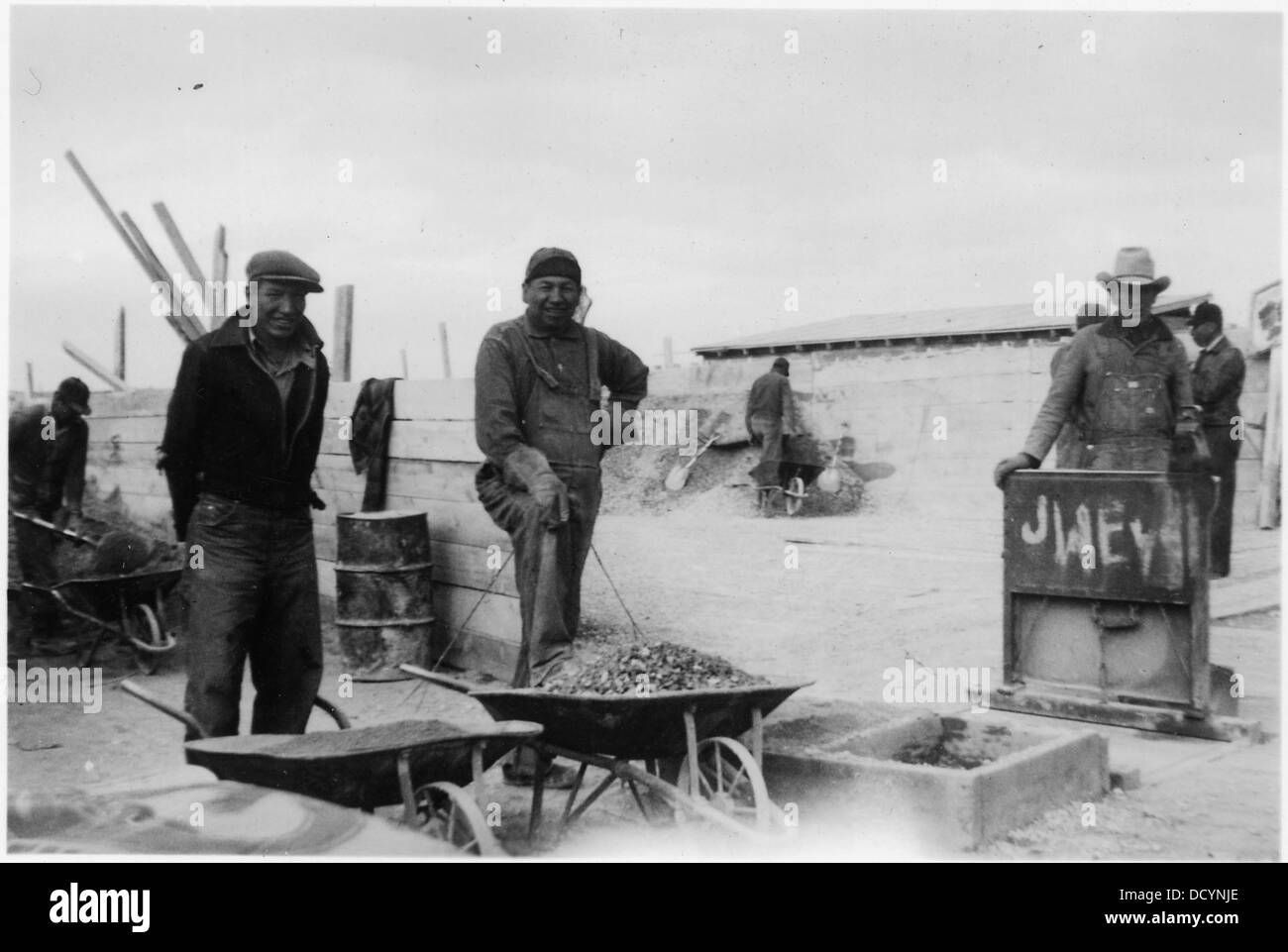 Workers laboring on the Oglala Dam project, contributing to the ...
