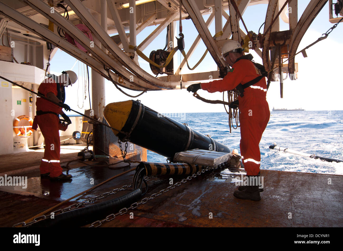 Gun Mechanics working on Seismic Air guns at Gun Deck in the seismic ...