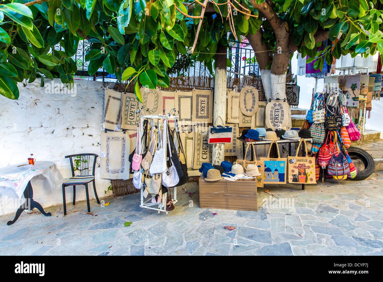 Traditional textiles on a market stall, colorful fabric, handmade ...