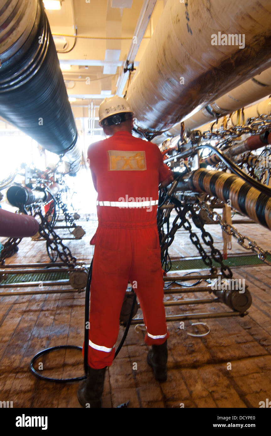 Gun Mechanics working on Seismic Air guns at Gun Deck in the seismic ...