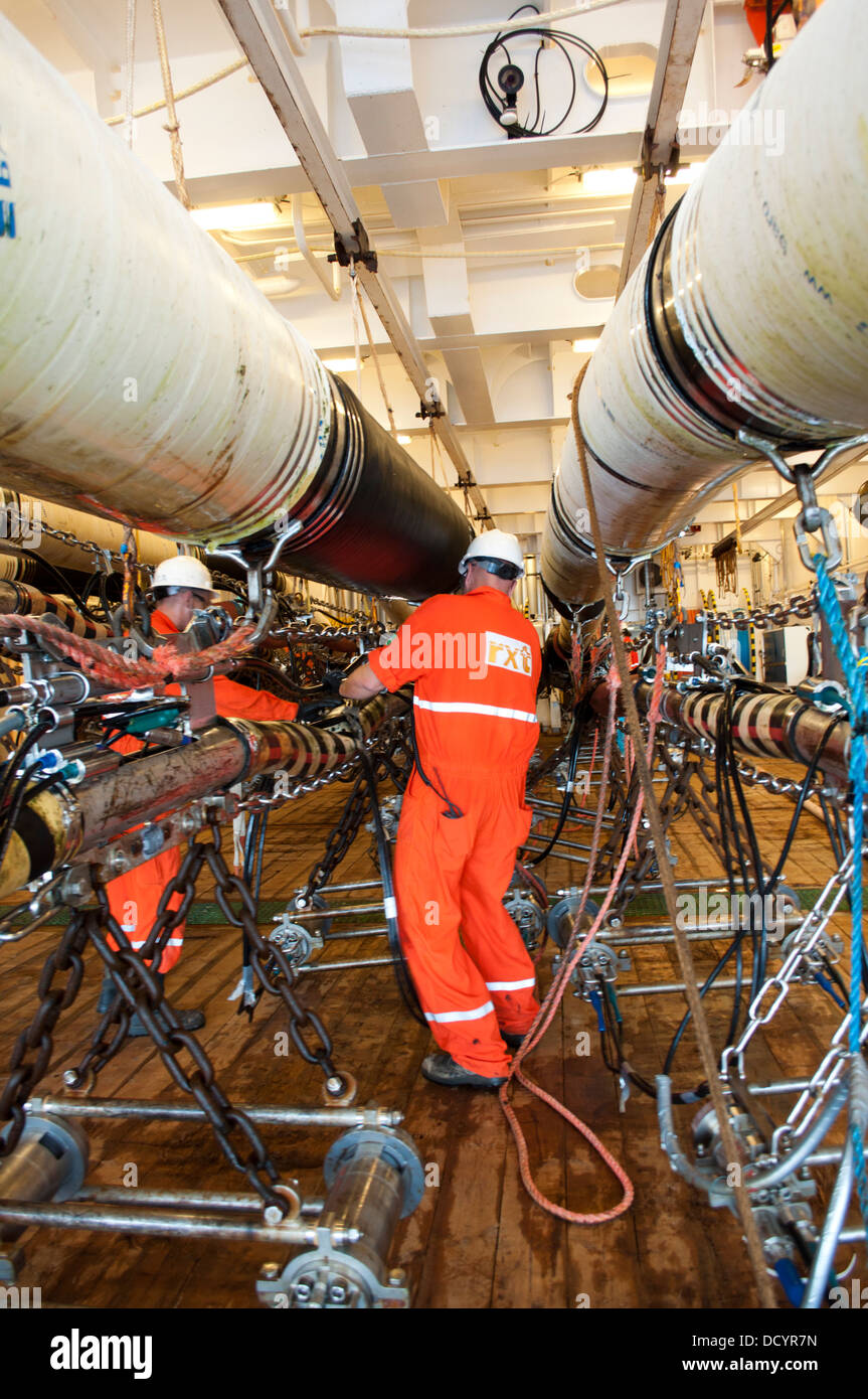 Gun Mechanics working on Seismic Air guns at Gun Deck in the seismic ...