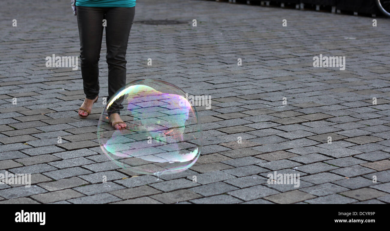 woman about to step on a bubble in berlin, germany Stock Photo - Alamy