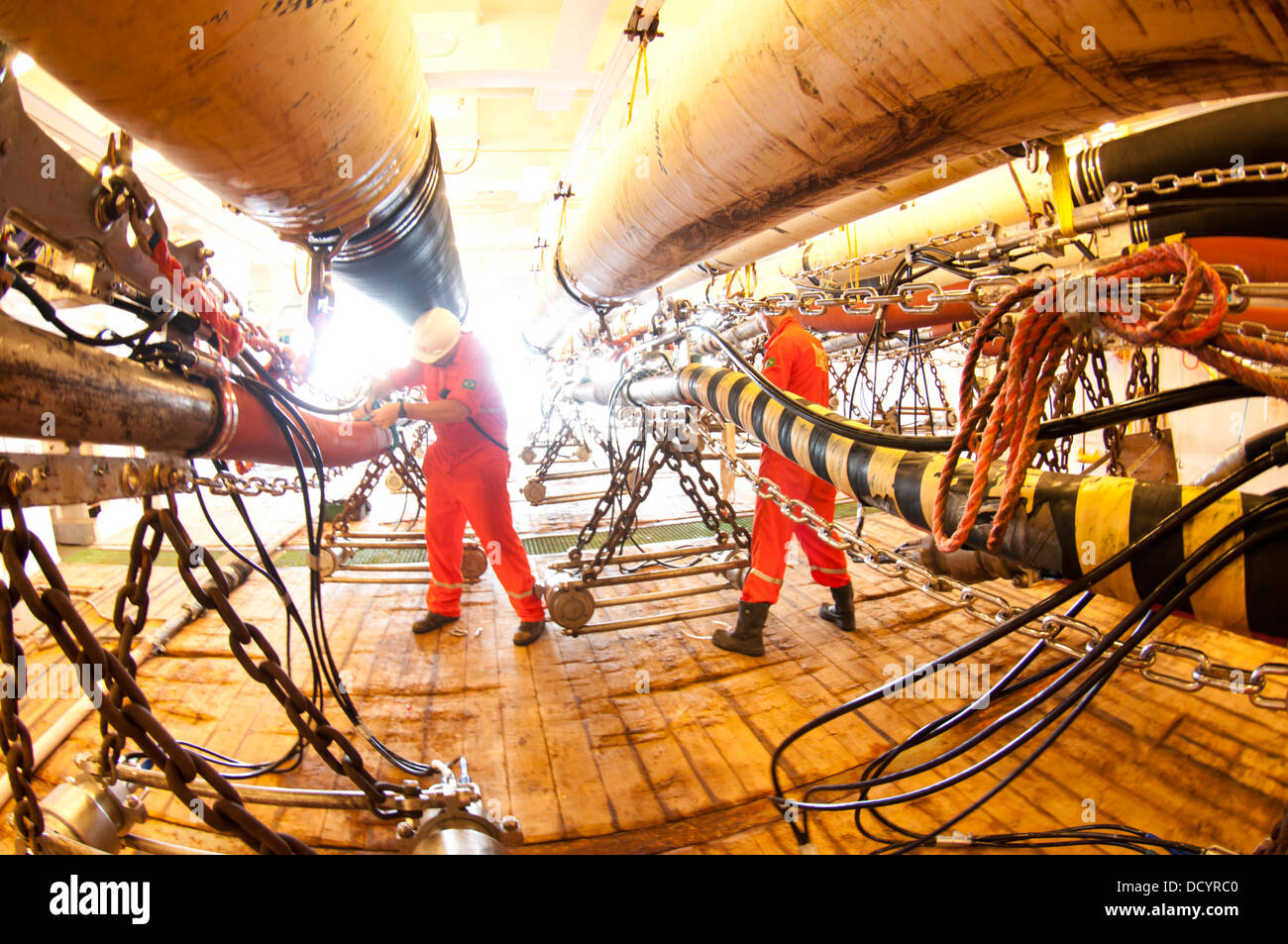 Gun Mechanics working on Seismic Air guns at Gun Deck in the seismic ...