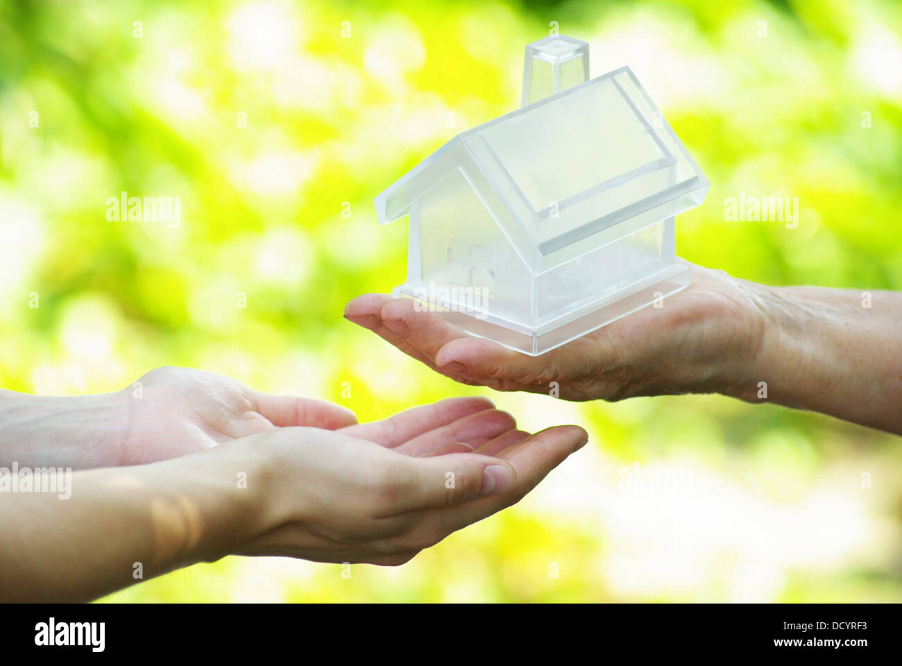 house in hands Stock Photo - Alamy