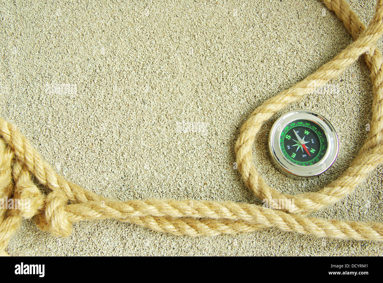 rope on sand Stock Photo - Alamy