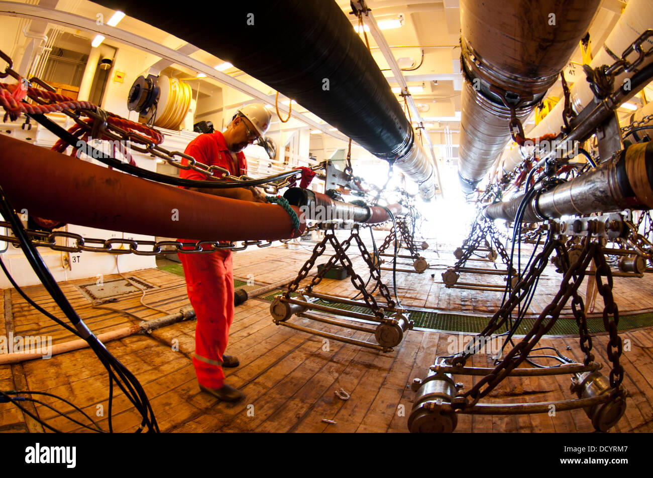 Gun Mechanics working on Seismic Air guns at Gun Deck in the seismic ...
