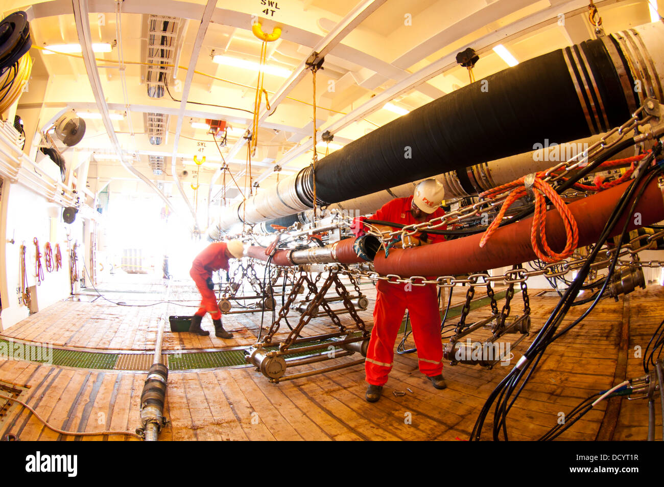 Gun Mechanics working on Seismic Air guns at Gun Deck in the seismic ...