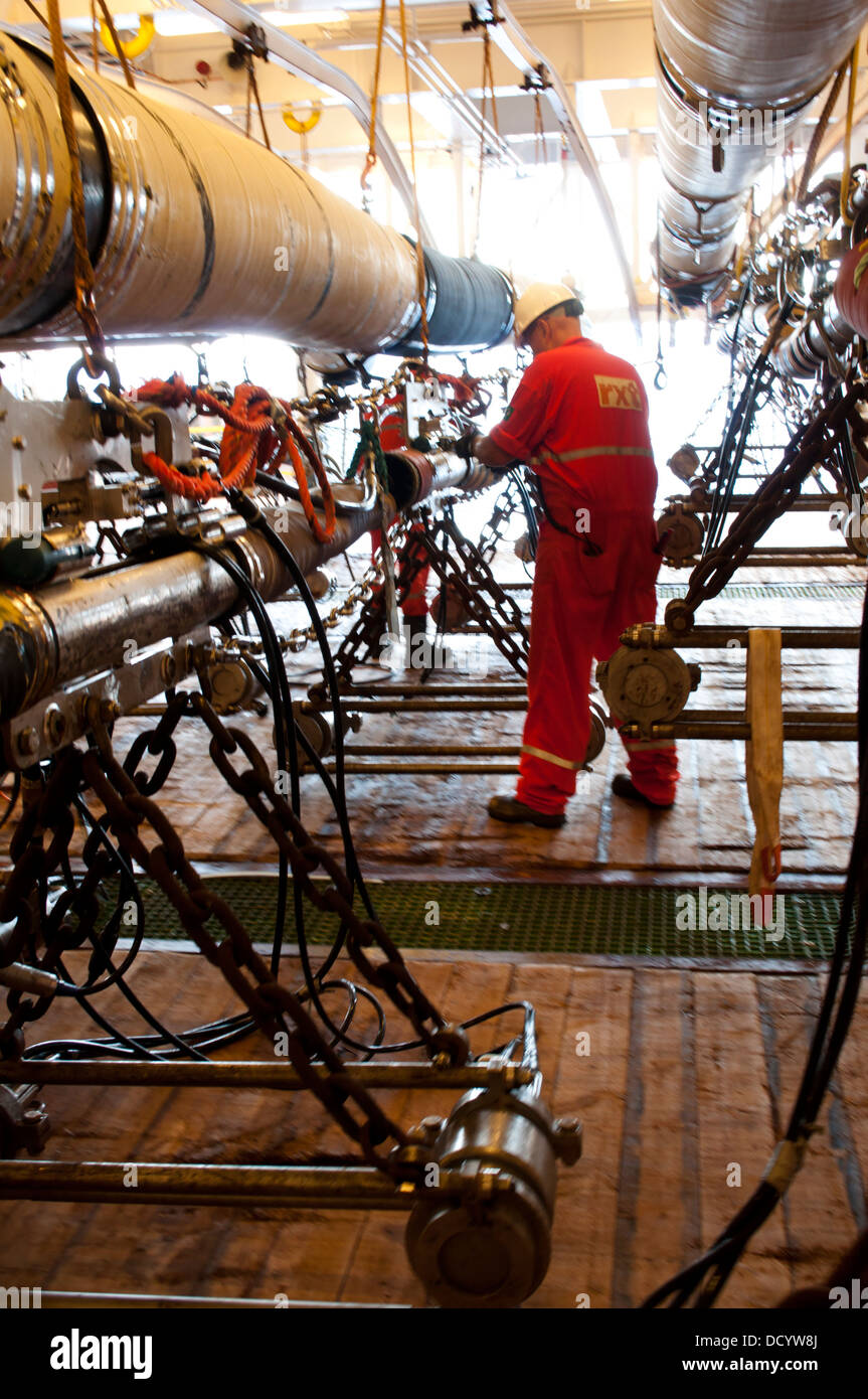 Gun Mechanics working on Seismic Air guns at Gun Deck in the seismic ...